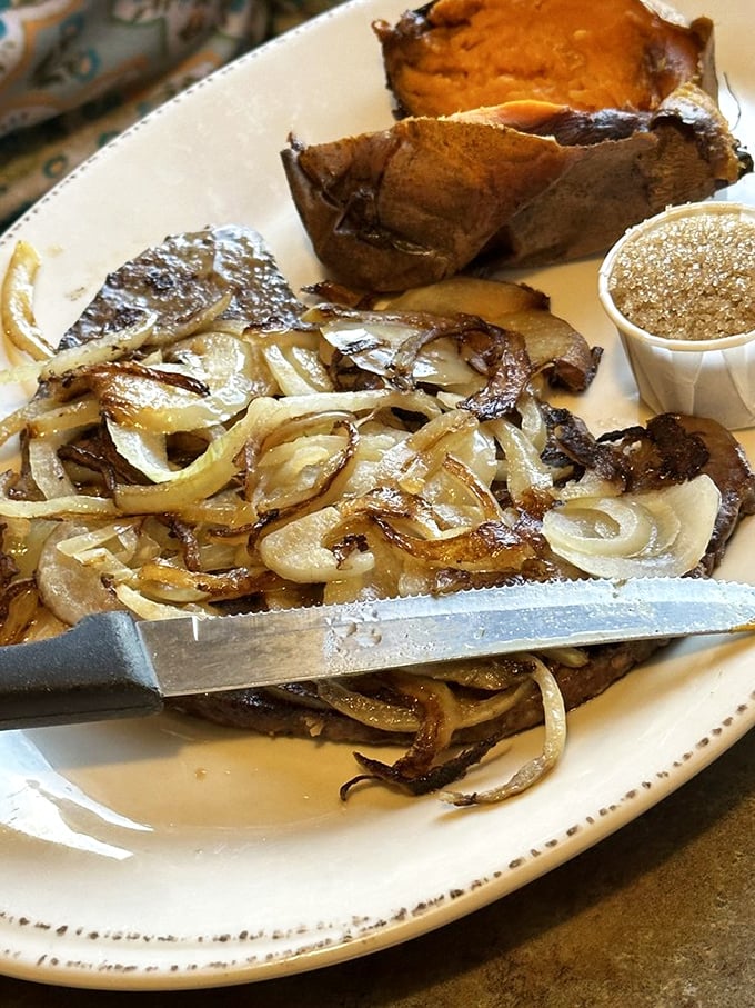 Liver and onions with perfectly caramelized edges&mdash;a dish that separates casual diners from true comfort food aficionados.