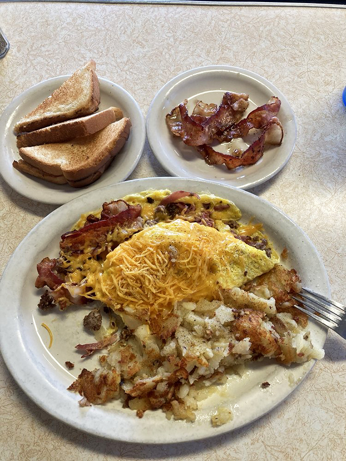 The omelet that launched a thousand satisfied sighs&mdash;where cheese meets meat in a harmonious relationship that puts Hollywood romances to shame.