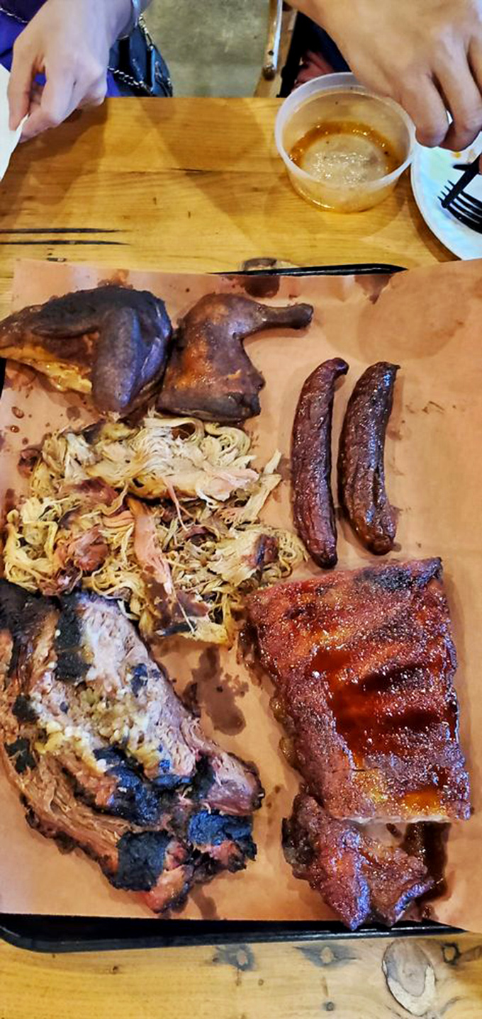 Pickles, mac and cheese, and perfectly smoked meats&mdash;this tray contains more happiness than most people experience in an entire week.