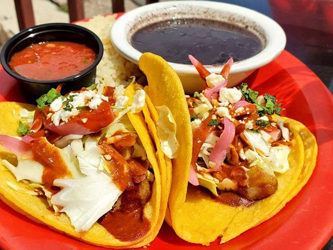 Tacos that tell a story of cultural crossroads. The vibrant colors and thoughtful presentation suggest these aren't just food&mdash;they're edible art with attitude.