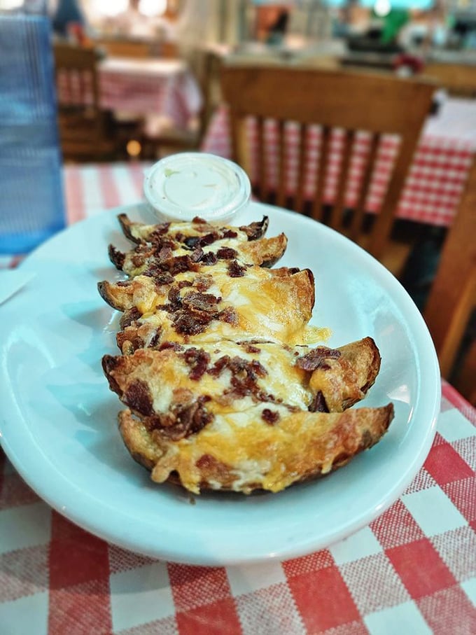 Loaded potato skins&mdash;where cheese, bacon, and potato unite in crispy-edged harmony. These aren't trendy small plates; they're generous portions from a more civilized age.