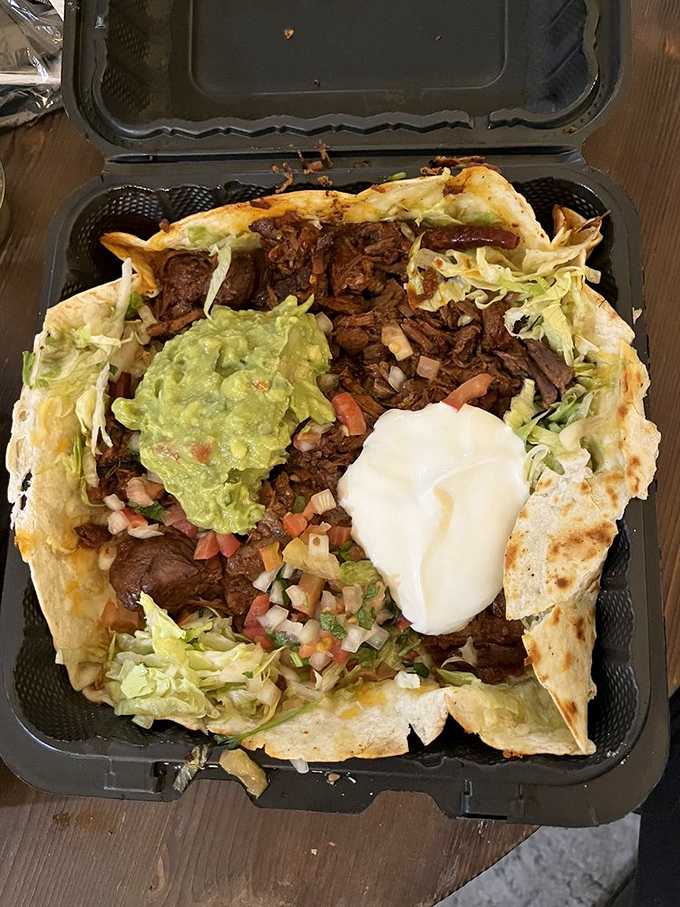 This isn't just a quesadilla&mdash;it's an open-faced love letter to barbacoa, crowned with guacamole and sour cream. Takeout never looked so tempting.
