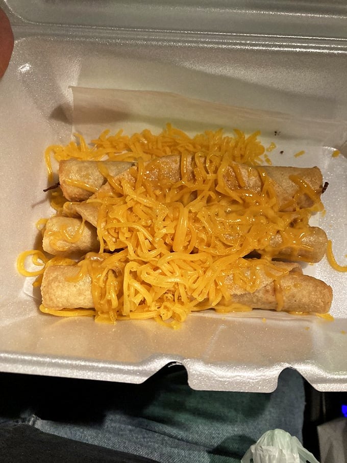 These rolled tacos aren't just food; they're crunchy vehicles delivering cheese and happiness directly to your soul.