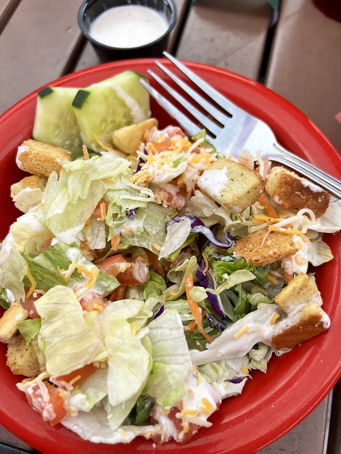 Even the salad gets special treatment here. When vegetables look this good, you might temporarily forget you came for the chicken. Temporarily.