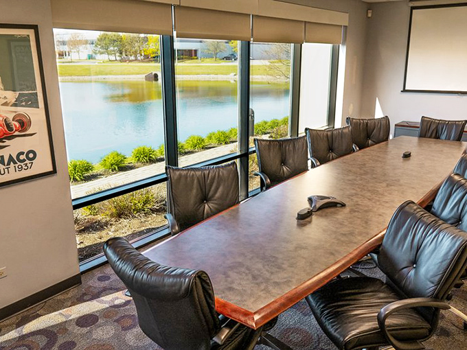 The Monaco Room: where corporate strategy sessions transform into heated debates about who brake-checked whom in turn three.