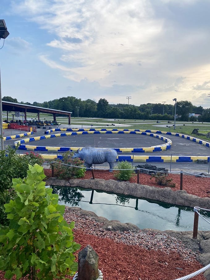 Where water meets wheels. This clever design integrates mini-golf water features with a view of the racing action, satisfying both speed demons and putting pros.