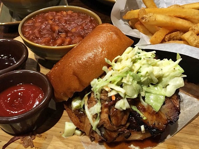 This isn't just a sandwich&mdash;it's architecture. Layers of meat, slaw, and sauce create a skyscraper of flavor that demands a two-handed salute.