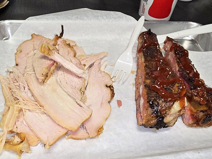 Turkey and ribs sharing a tray like old friends. One lean, one indulgent&mdash;proving barbecue wisdom knows balance is everything.
