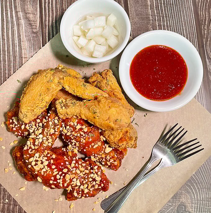 The contrast between golden fried and fiery red Yangnyum chicken is like having two different vacations on the same plate.