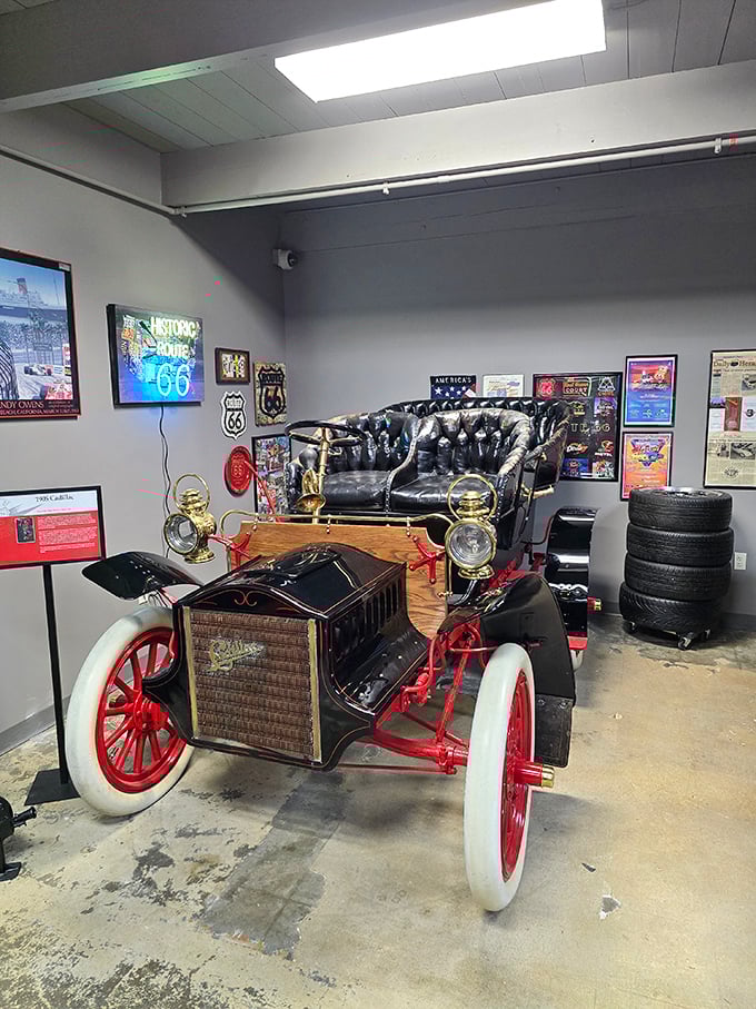 The 1905 Cadillac sits proudly with its leather bench seat and brass accents &ndash; from a time when "horsepower" was still a literal comparison.