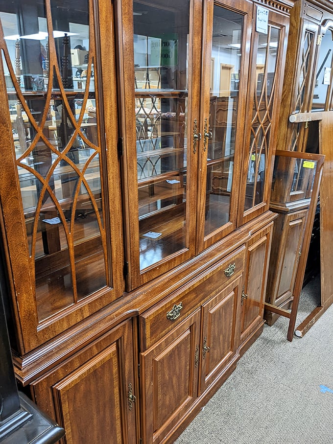 Wooden cabinets with the kind of craftsmanship that makes modern furniture weep&mdash;displaying the graceful curves and solid construction of a bygone era.