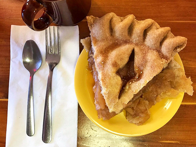 Apple pie with a crust so flaky it should be illegal. The kind of dessert that makes you consider ordering a second slice before finishing the first.