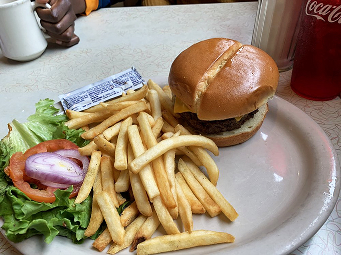 The cheeseburger that launched a thousand napkins—simple, honest, and proof that some classics need no reinvention, just proper execution.