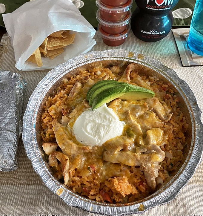 Arroz con pollo that makes you question why you ever eat chicken any other way. The creamy sauce blankets tender chicken like a delicious security blanket.