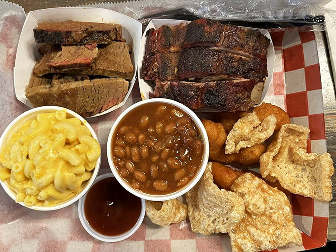 When ribs and brisket share real estate with mac and cheese and beans, you're not just having lunch—you're having a Southern summit meeting.