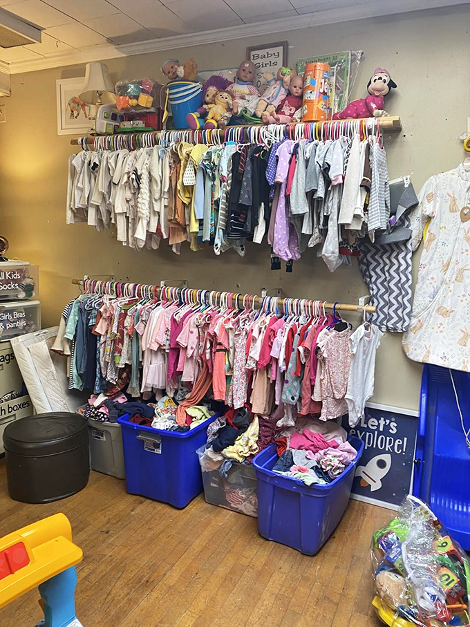 Tiny garments for tiny humans arranged with military precision – proof that even the smallest clothing items can hold the biggest memories.