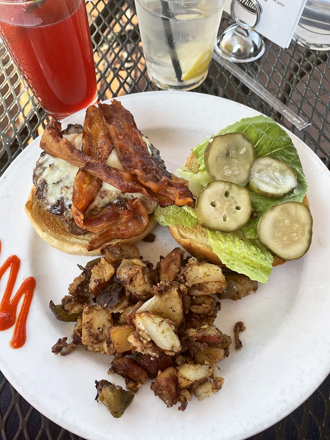 Not your average burger joint offering. This bacon-adorned beauty comes with house potatoes that have clearly been educated in the fine arts of seasoning.