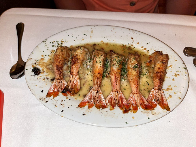 Shrimp bathing in buttery goodness like they're at a day spa. That sauce is definitely worth the extra napkin (or three).