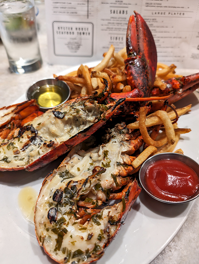 Behold the baked stuffed lobster, wearing herbs and butter like a custom-tailored suit. The claws practically wave hello before saying goodbye.