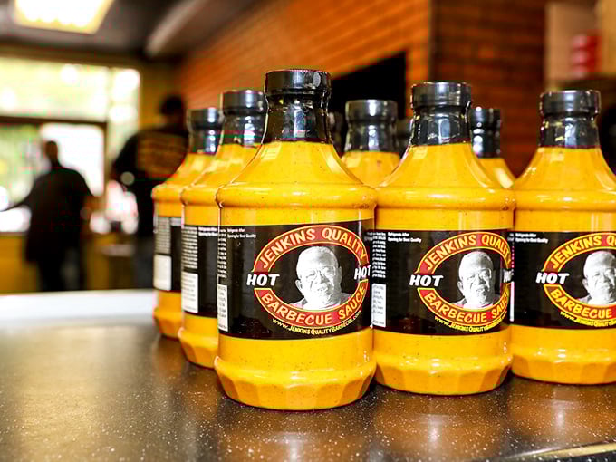 Those squeeze bottles aren't just containers&mdash;they're magic wands dispensing generations of flavor wisdom, each one a different path to barbecue nirvana.