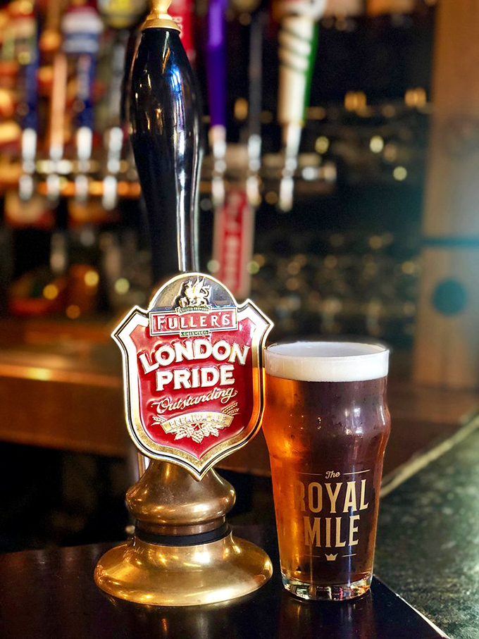 London Pride isn't just a beer – it's liquid history, served in a glass that proudly bears the establishment's name like a royal coat of arms.