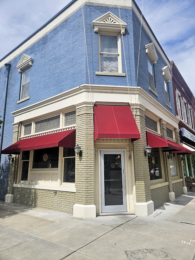 The bright blue building with red awnings houses Bella Sol Bistro, proof that Swedish culinary influence in Lindsborg extends beyond just meatballs and lingonberries.