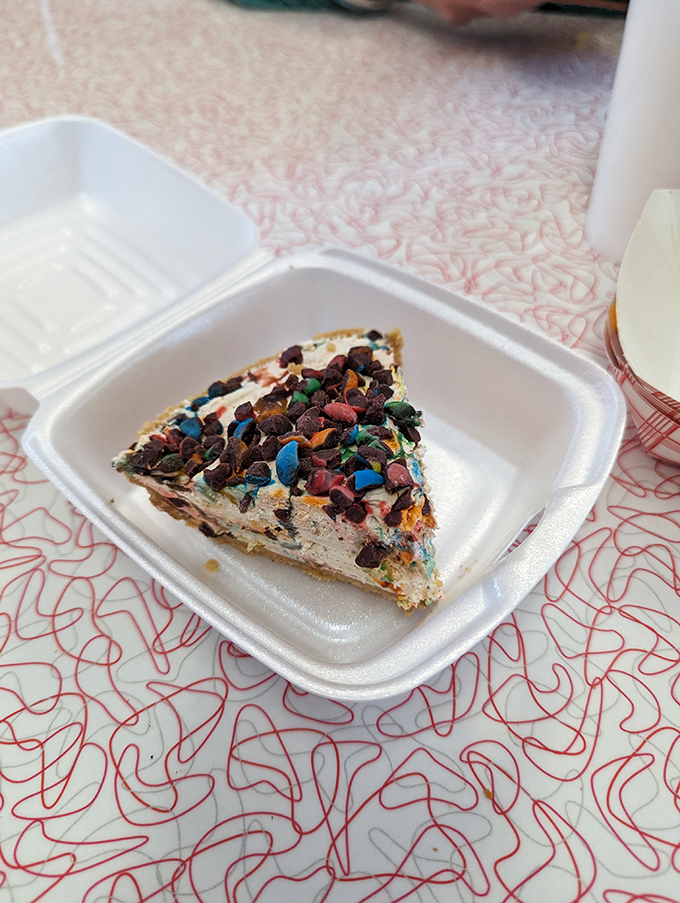 Berry cheesecake with candy confetti on top? Someone understood the assignment of making dessert both sophisticated and joyful at once.