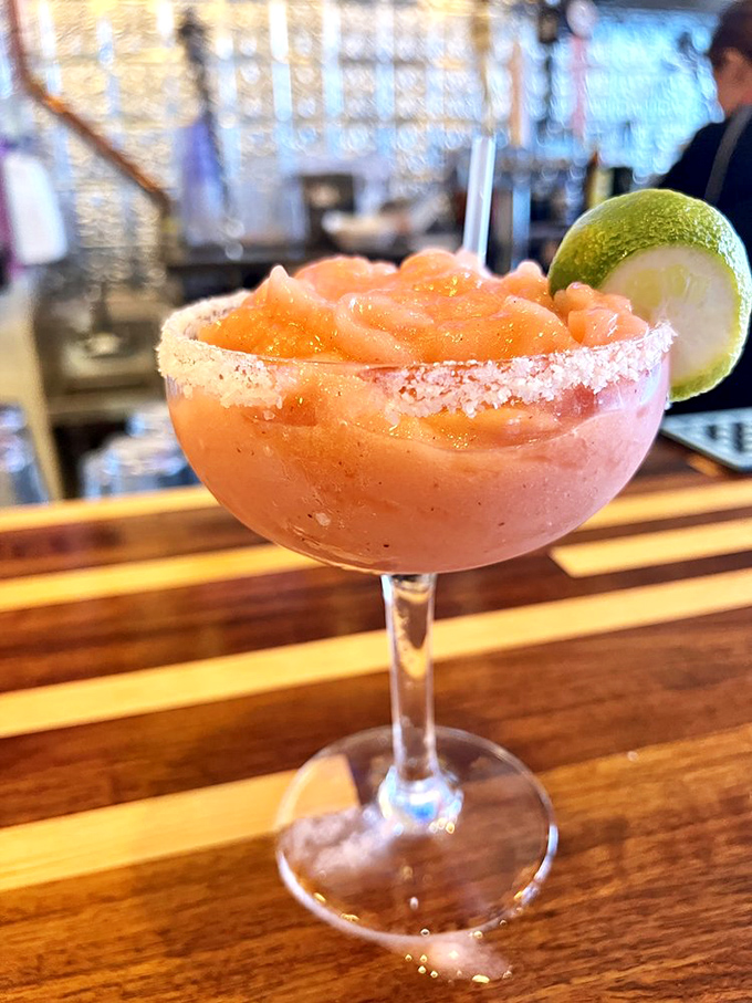 Not just a margarita, but a sunset in a glass—the salt rim acting as the perfect seasoning for whatever tales you're about to tell.