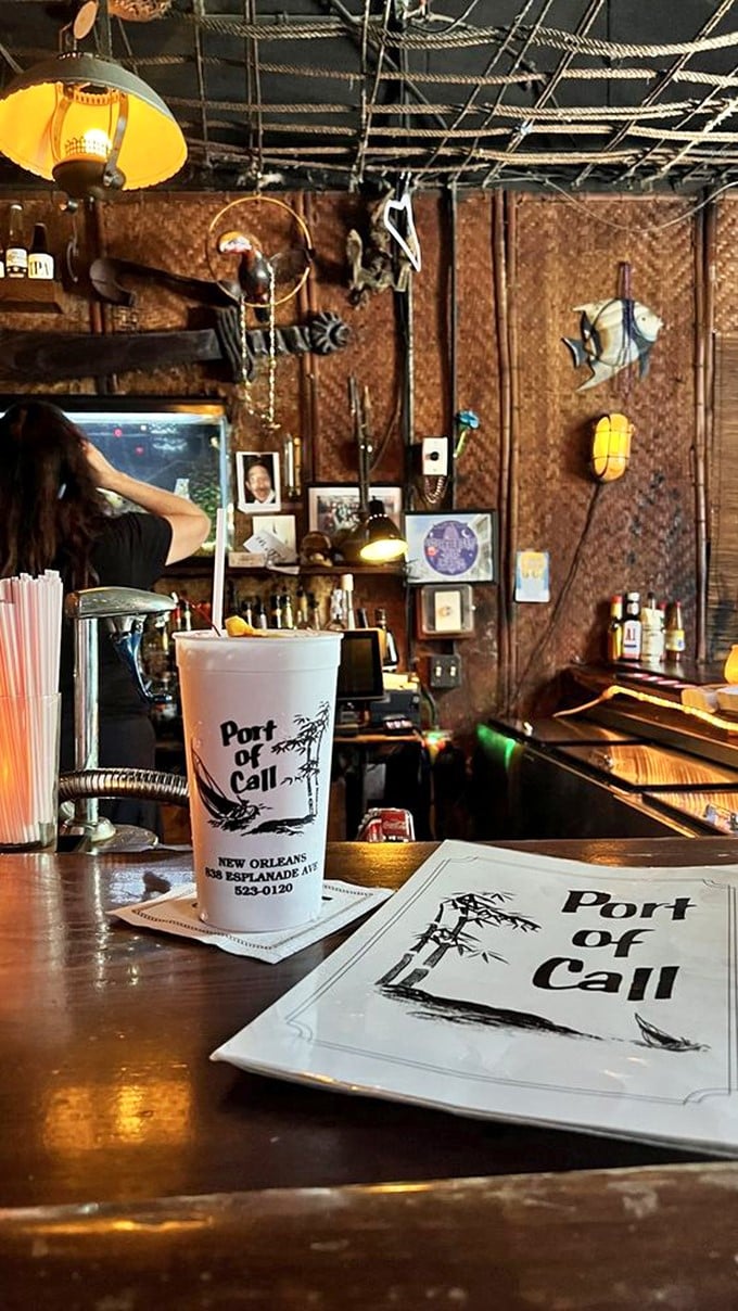 The infamous Neptune's Monsoon, where fruit juice meets rum in a glass designed for giants and poor decision-making.