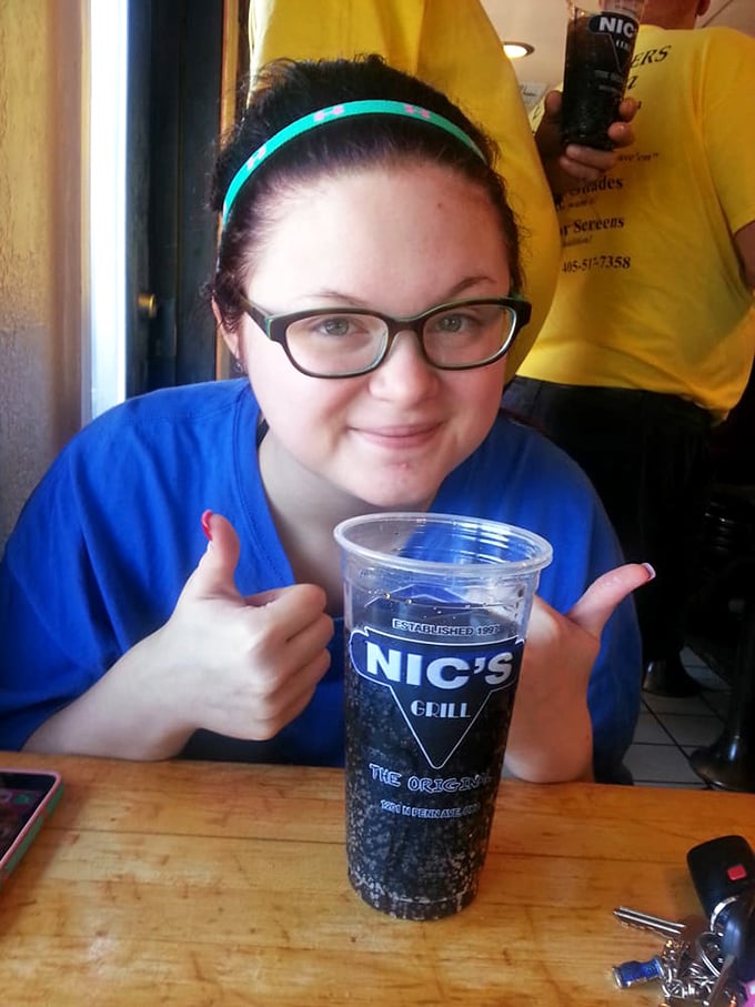 Even the drinks at Nic's get the special treatment, served in branded cups that locals probably collect like trophies.