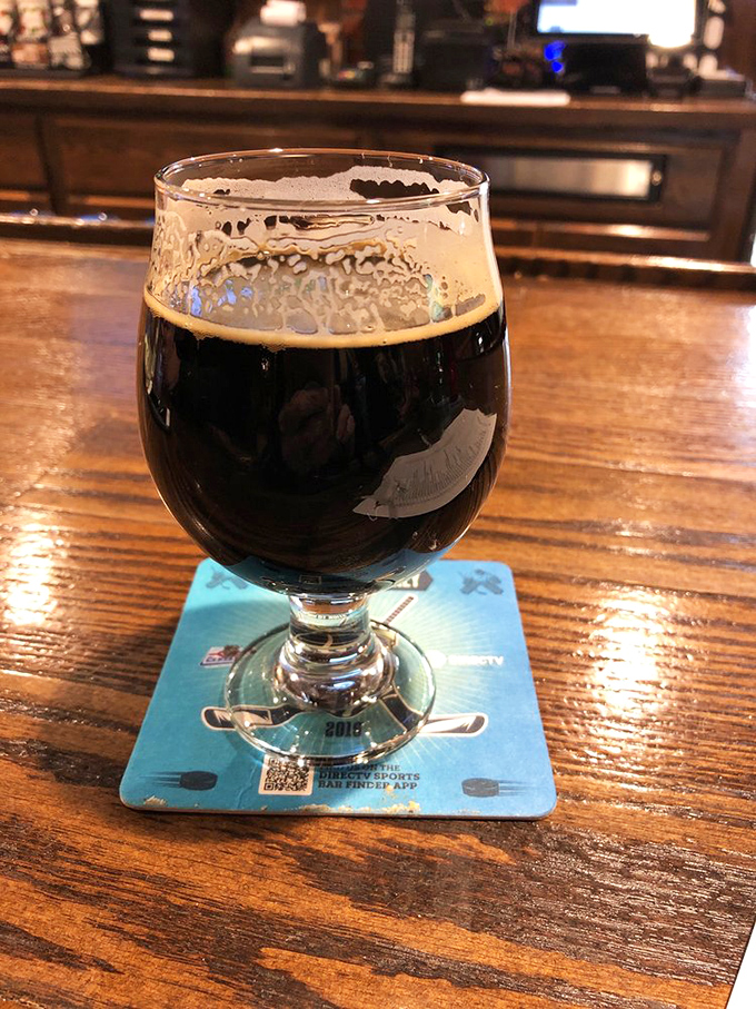 A proper stout in a proper glass &ndash; because tackling legendary burgers requires proper hydration of the adult variety.