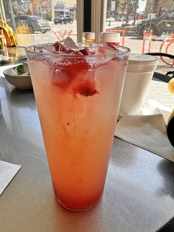 This isn't just a pink drink—it's summer in a glass, the kind of refreshment that makes you forgive Denver's occasional 90-degree days.