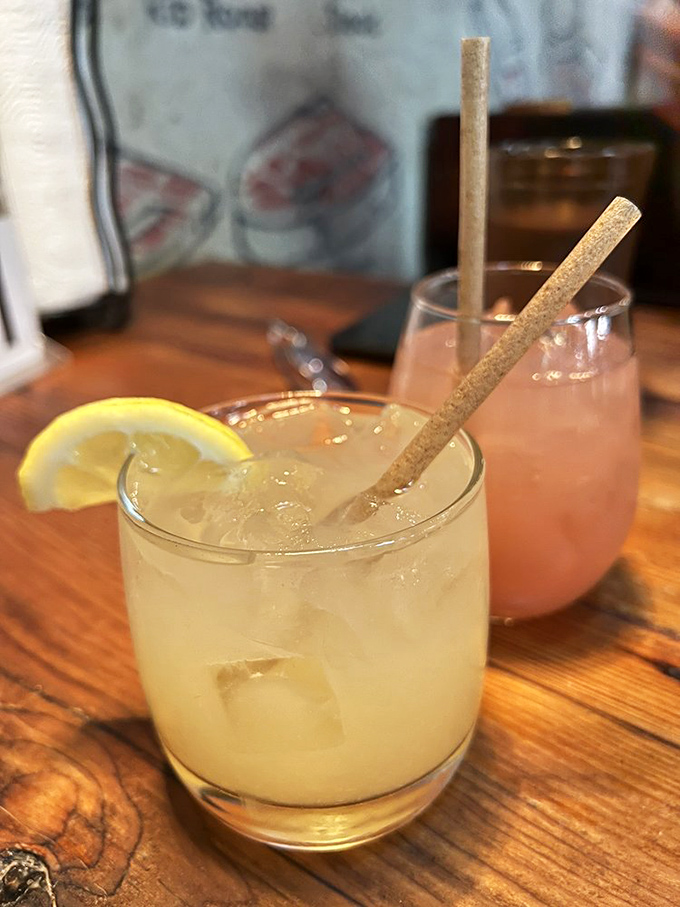 Cocktails that don't apologize for being delicious. Those paper straws say "We care about oceans" while that whiskey says "But first, enjoy yourself."