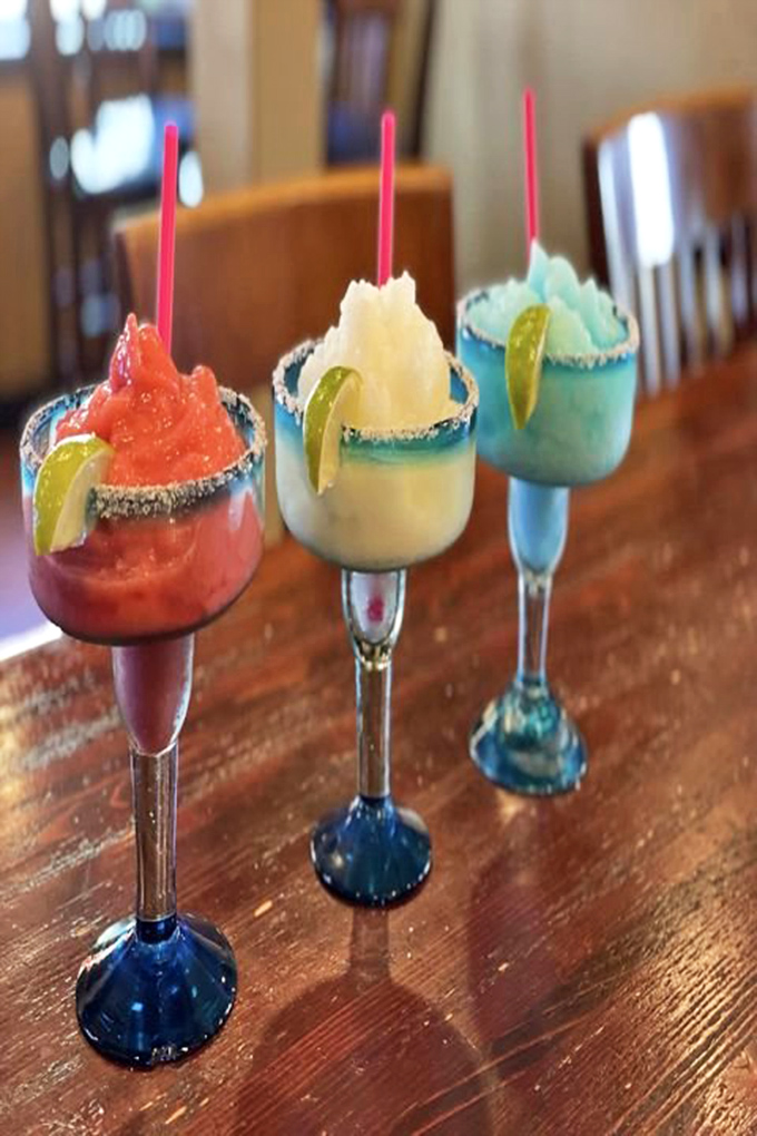 These margaritas aren't just drinks&mdash;they're vacation in a glass. With vibrant colors and salt-rimmed sophistication, they're the perfect green chili sidekick.