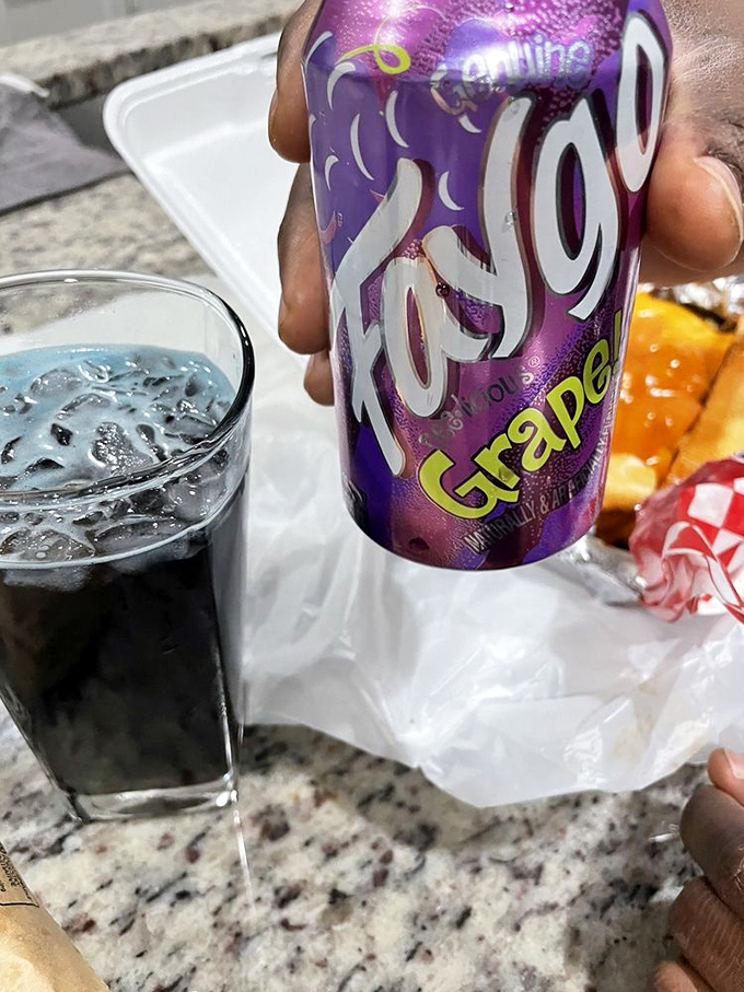 Even the beverages get the royal treatment here. That grape soda isn't just a drink&mdash;it's the perfect counterpoint to burger perfection.