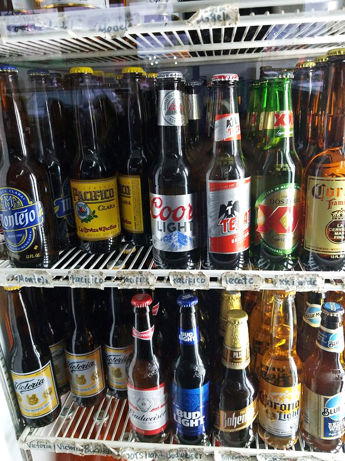 The beer fridge &ndash; where Mexican cervezas mingle with domestic brews like a delicious international summit in cold storage.