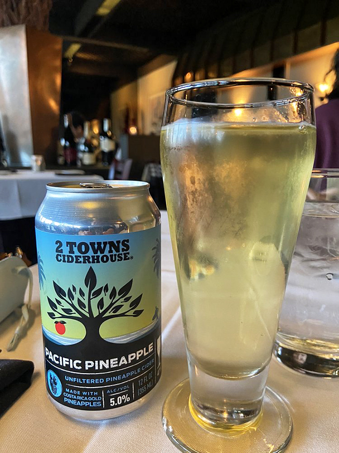 The dining room's stained glass and warm woods create that perfect "special but not stuffy" atmosphere we all crave.