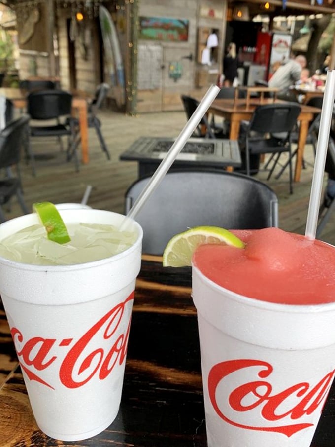 Nothing pairs with seafood quite like a cold drink with a lime wedge. The plastic cup says "vacation" even if you're just on lunch break.