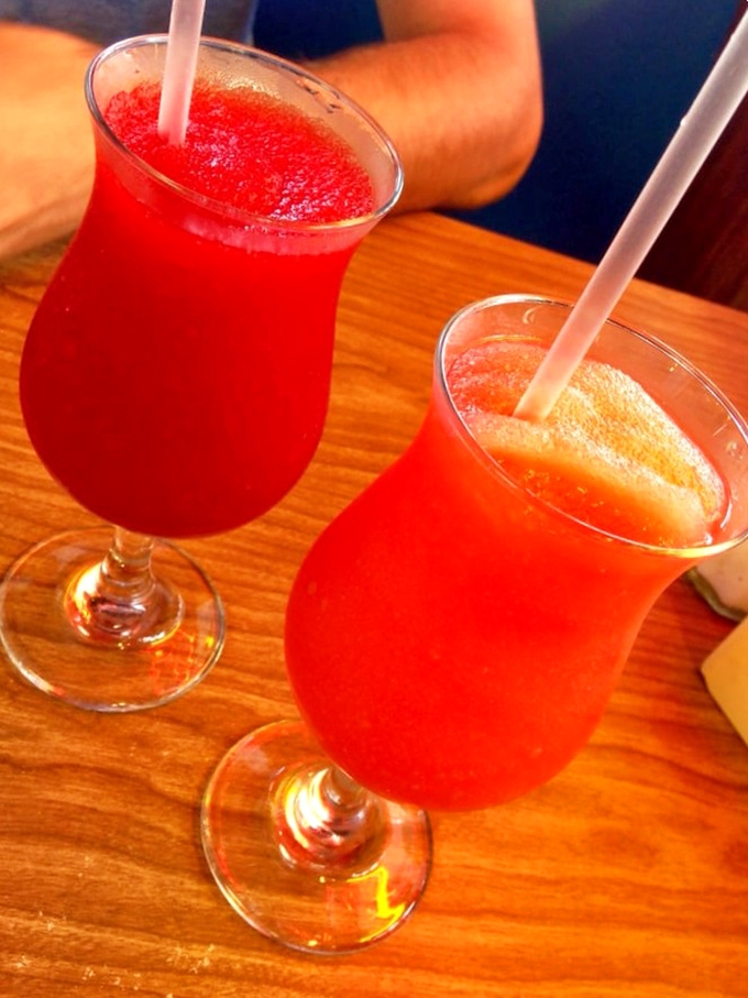 Tropical libations that'll make you feel like you're on vacation! These vibrant drinks are like liquid sunshine in a glass.