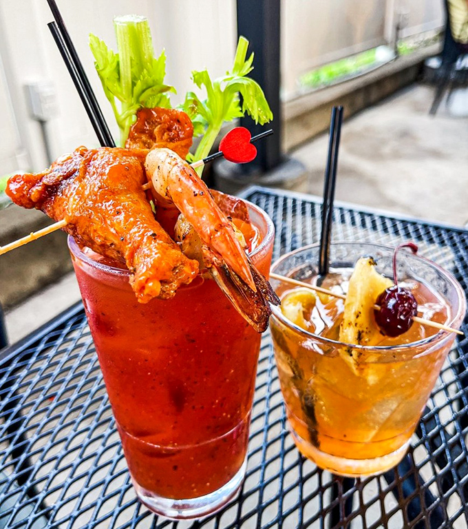 These aren't just drinks; they're liquid masterpieces topped with enough garnish to qualify as a small meal. That Bloody Mary could cure whatever ails you.