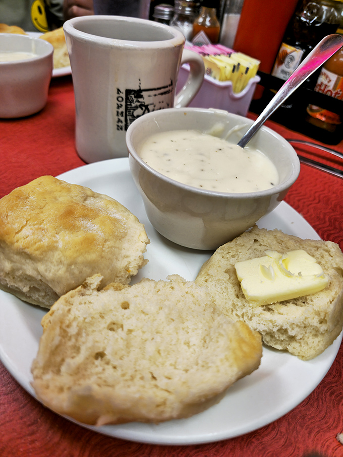 Biscuits so fluffy they could moonlight as pillows, with gravy that's clearly been getting therapy&mdash;perfectly smooth and beautifully speckled.