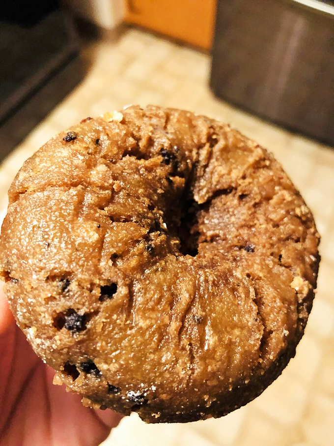 A sugar-dusted donut floating in what appears to be custard. Some relationships are complicated; this delicious pairing is anything but.