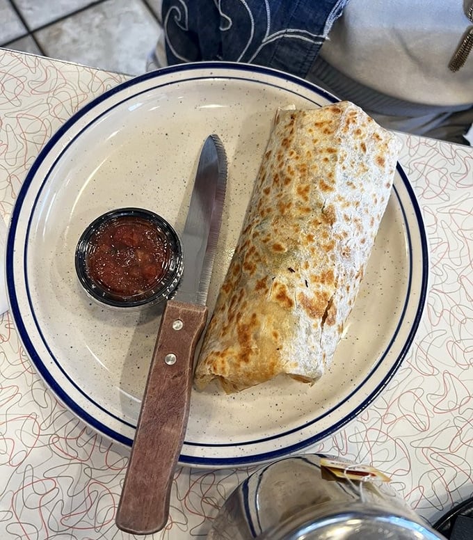 Breakfast burrito: where morning ingredients throw a party wrapped in a tortilla. That salsa on the side? The perfect plus-one.