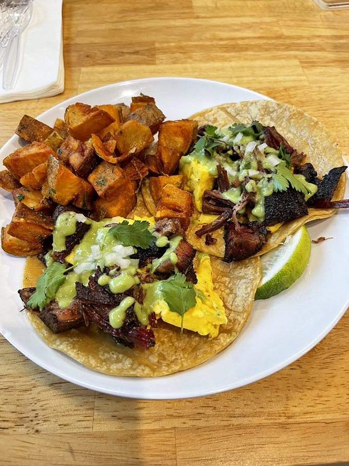Breakfast tacos reimagined through a smoke master's lens. Those crispy potatoes alongside are no afterthought&mdash;they're essential supporting characters.