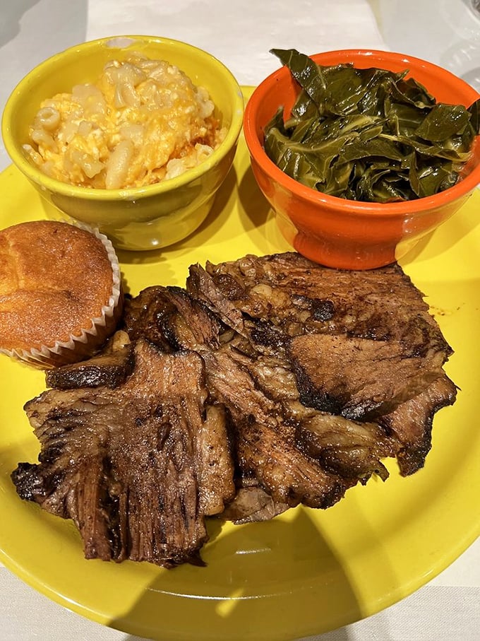 Brisket so tender it practically surrenders to your fork, flanked by mac & cheese that's having its own moment of glory.