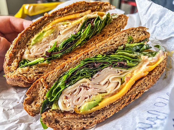 Layer upon layer of turkey, greens, and toppings&mdash;like a geological expedition where every stratum reveals delicious new discoveries.