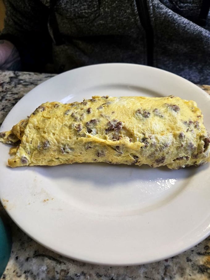 This omelet didn't just invite pepperoni to breakfast&mdash;it rolled out the red carpet. Those crispy potatoes on the side aren't playing second fiddle to anyone. 