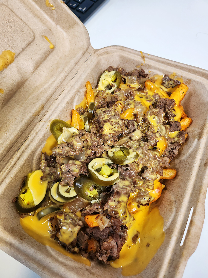 Loaded cheesesteak fries &ndash; where the boundary between fork and finger food blissfully blurs into cheesy, beefy oblivion.