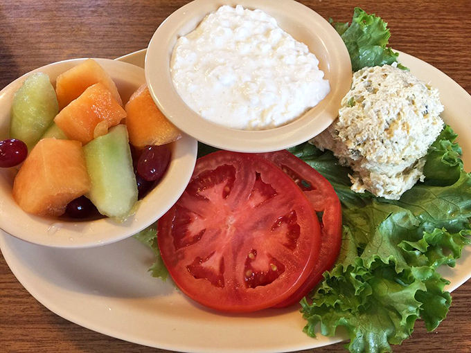 A lighter option that doesn't sacrifice flavor&mdash;fresh fruit, cottage cheese, and chicken salad for when you want virtue with a side of indulgence.