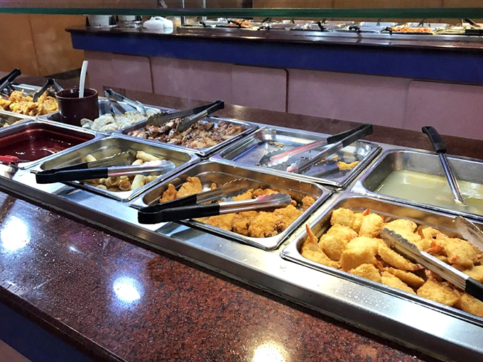 Golden-fried chicken nestles against plump shrimp, while crispy vegetables add color to this plate of perfectly executed classics.